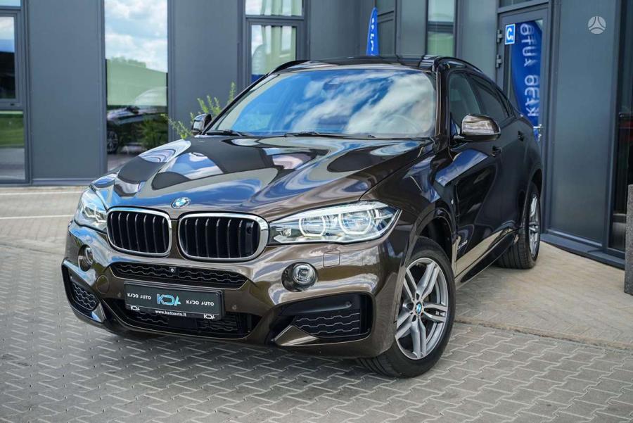Brown BMW X6 2016 in Kaunas, with an engine capacity of 3.00 L and mileage of 144 thousand km for 27450 €, photo 6 on AUTOMOTO.COM.LV