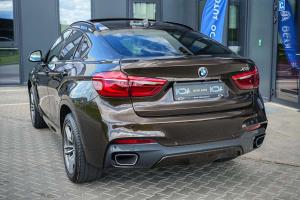 Brown BMW X6 2016 in Kaunas, with an engine capacity of 3.00 L and mileage of 144 thousand km for 27450 €, photo 11 on AUTOMOTO.COM.LV