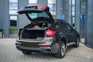 Brown BMW X6 2016 in Kaunas, with an engine capacity of 3.00 L and mileage of 144 thousand km for 27450 €, photo 14 on AUTOMOTO.COM.LV