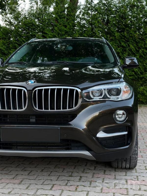 Brown BMW X6 2016 in Cesis, with an engine capacity of 3.00 L and mileage of 217 thousand km for 19950 €, photo 2 on AUTOMOTO.COM.LV