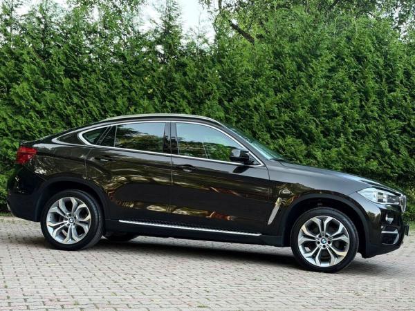 Brown BMW X6 2016 in Cesis, with an engine capacity of 3.00 L and mileage of 217 thousand km for 19950 €, photo 3 on AUTOMOTO.COM.LV