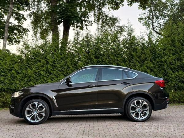 Brown BMW X6 2016 in Cesis, with an engine capacity of 3.00 L and mileage of 217 thousand km for 19950 €, photo 4 on AUTOMOTO.COM.LV