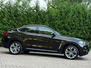 Brown BMW X6 2016 in Cesis, with an engine capacity of 3.00 L and mileage of 217 thousand km for 19950 €, photo 4 on AUTOMOTO.COM.LV