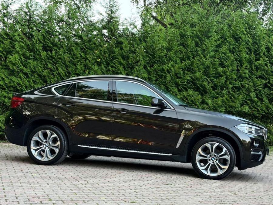 Brown BMW X6 2016 in Cesis, with an engine capacity of 3.00 L and mileage of 217 thousand km for 19950 €, photo 4 on AUTOMOTO.COM.LV
