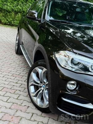 Brown BMW X6 2016 in Cesis, with an engine capacity of 3.00 L and mileage of 217 thousand km for 19950 €, photo 6 on AUTOMOTO.COM.LV