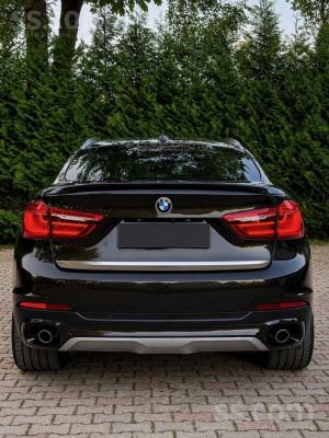 Brown BMW X6 2016 in Cesis, with an engine capacity of 3.00 L and mileage of 217 thousand km for 19950 €, photo 9 on AUTOMOTO.COM.LV