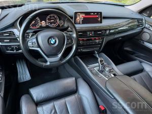 Brown BMW X6 2016 in Cesis, with an engine capacity of 3.00 L and mileage of 217 thousand km for 19950 €, photo 11 on AUTOMOTO.COM.LV