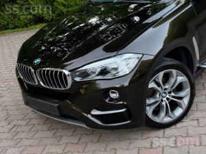 Brown BMW X6 2016 in Cesis, with an engine capacity of 3.00 L and mileage of 217 thousand km for 19950 €, photo 19 on AUTOMOTO.COM.LV
