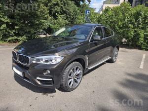 Brown BMW X6 2016 in Riga, with an engine capacity of 3.00 L and mileage of 95 thousand km for 27990 €, photo  on AUTOMOTO.COM.LV