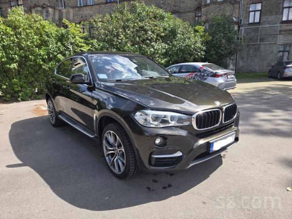 Brown BMW X6 2016 in Riga, with an engine capacity of 3.00 L and mileage of 95 thousand km for 27990 €, photo 2 on AUTOMOTO.COM.LV