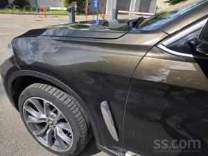 Brown BMW X6 2016 in Riga, with an engine capacity of 3.00 L and mileage of 95 thousand km for 27990 €, photo 6 on AUTOMOTO.COM.LV