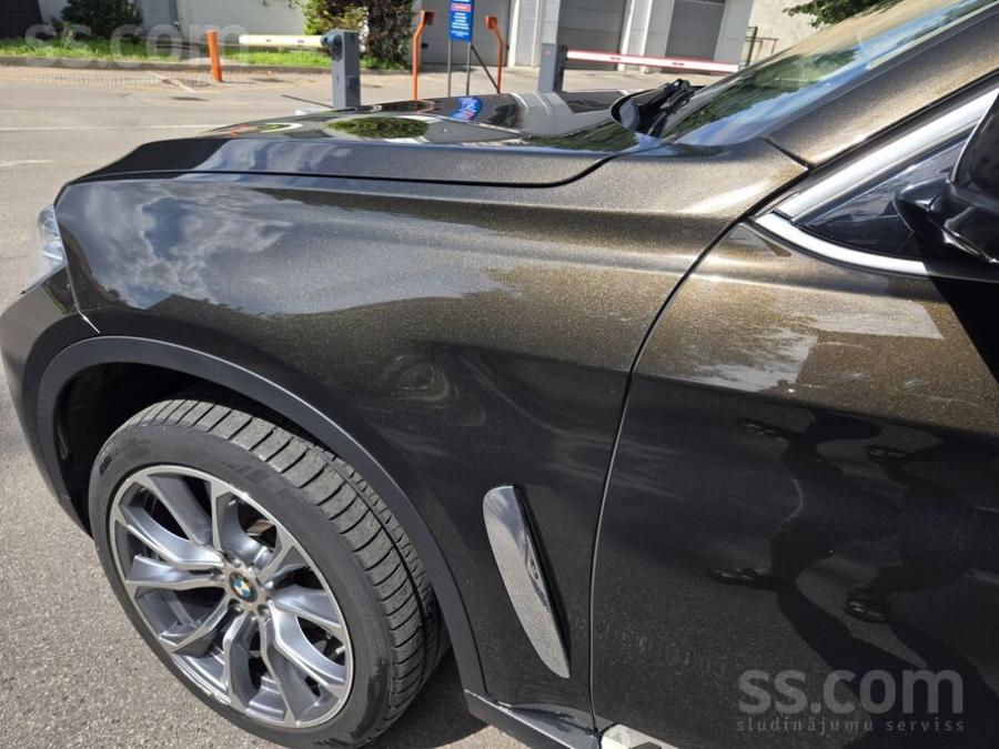 Brown BMW X6 2016 in Riga, with an engine capacity of 3.00 L and mileage of 95 thousand km for 27990 €, photo 6 on AUTOMOTO.COM.LV