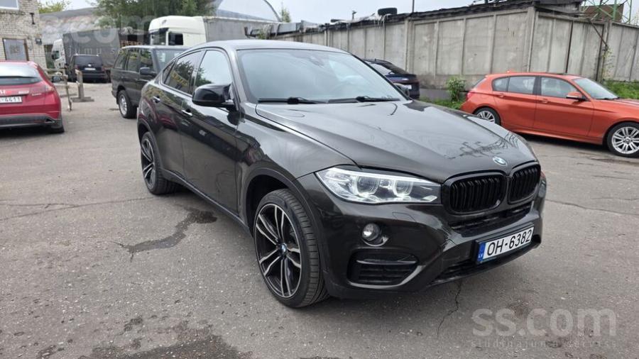 Brown BMW X6 2016 in Riga, with an engine capacity of 3.00 L and mileage of 181 thousand km for 24990 €, photo 3 on AUTOMOTO.COM.LV