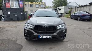 Brown BMW X6 2016 in Riga, with an engine capacity of 3.00 L and mileage of 181 thousand km for 24990 €, photo 4 on AUTOMOTO.COM.LV