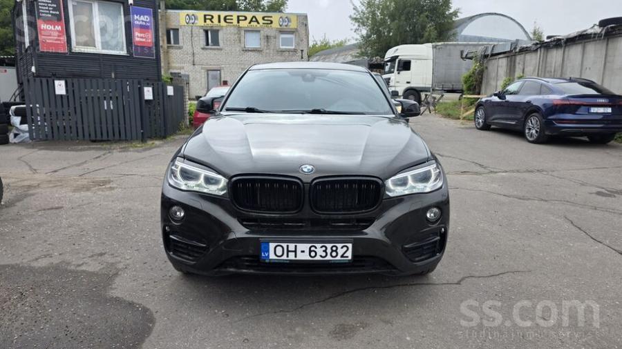 Brown BMW X6 2016 in Riga, with an engine capacity of 3.00 L and mileage of 181 thousand km for 24990 €, photo 4 on AUTOMOTO.COM.LV