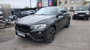 Brown BMW X6 2016 in Riga, with an engine capacity of 3.00 L and mileage of 181 thousand km for 24990 €, photo 5 on AUTOMOTO.COM.LV