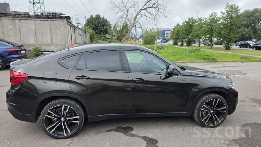 Brown BMW X6 2016 in Riga, with an engine capacity of 3.00 L and mileage of 181 thousand km for 24990 €, photo 6 on AUTOMOTO.COM.LV