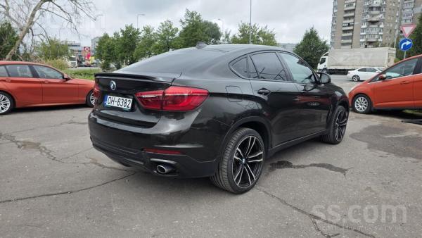 Brown BMW X6 2016 in Riga, with an engine capacity of 3.00 L and mileage of 181 thousand km for 24990 €, photo 6 on AUTOMOTO.COM.LV