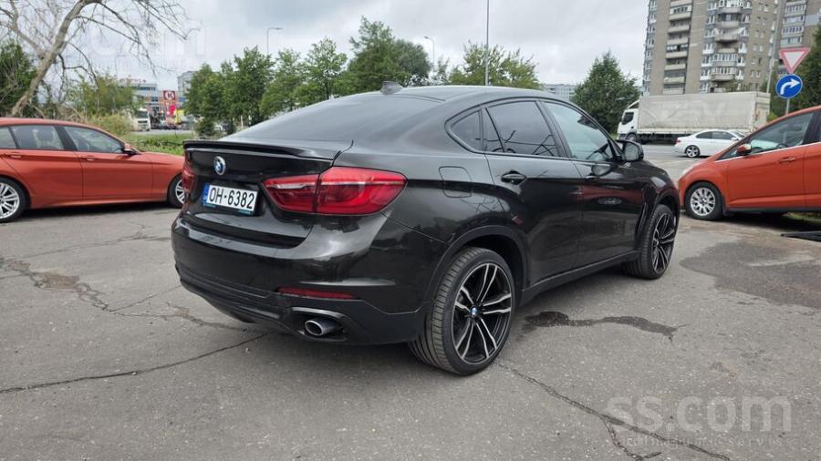 Brown BMW X6 2016 in Riga, with an engine capacity of 3.00 L and mileage of 181 thousand km for 24990 €, photo 7 on AUTOMOTO.COM.LV
