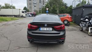 Brown BMW X6 2016 in Riga, with an engine capacity of 3.00 L and mileage of 181 thousand km for 24990 €, photo 8 on AUTOMOTO.COM.LV