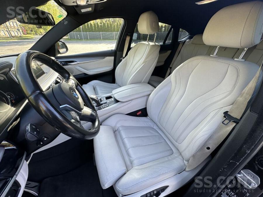Brown BMW X6 2018 in Jurmala, with an engine capacity of 3.00 L and mileage of 103 thousand km for 10850 €, photo 10 on AUTOMOTO.COM.LV