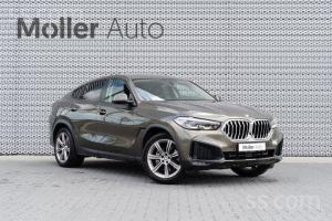 Brown BMW X6 2021 in Riga, with an engine capacity of 3.00 L and mileage of 104 thousand km for 56050 €, photo 3 on AUTOMOTO.COM.LV