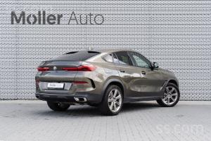 Brown BMW X6 2021 in Riga, with an engine capacity of 3.00 L and mileage of 104 thousand km for 56050 €, photo 5 on AUTOMOTO.COM.LV
