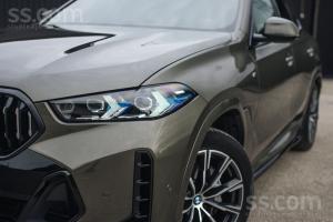 Brūns BMW X6 2024 Rīga, ar dzinēja tilpumu 3.00 L un nobraukumu 46 tūkst. km par 75999 €, foto 31 vietnē AUTOMOTO.COM.LV