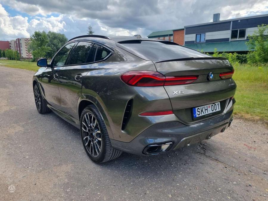 Brūns BMW X6 2025 Prienai, ar dzinēja tilpumu 3.00 L un nobraukumu 16 tūkst. km par 82500 €, foto 8 vietnē AUTOMOTO.COM.LV