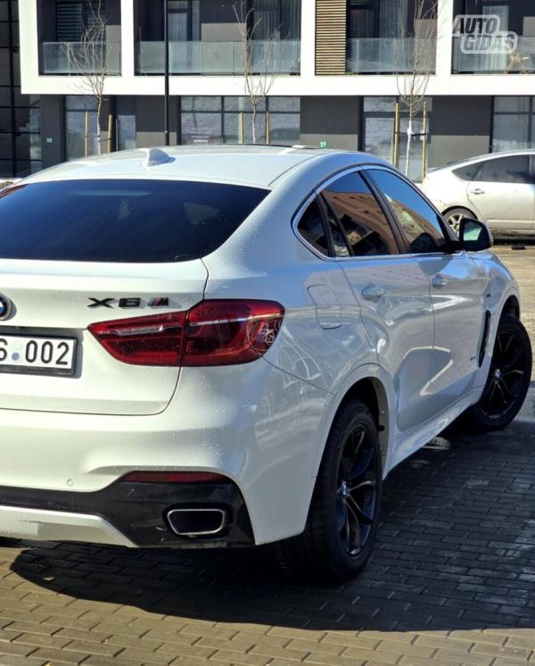 BMW X6 2015 in Vilnius, with an engine capacity of 3.00 L and mileage of 220 thousand km for 26000 €, photo 6 on AUTOMOTO.COM.LV