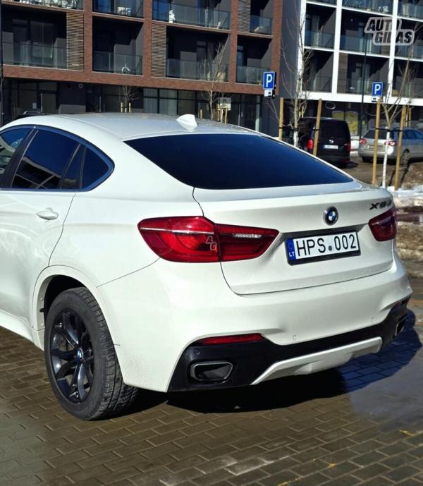 BMW X6 2015 in Vilnius, with an engine capacity of 3.00 L and mileage of 220 thousand km for 26000 €, photo 7 on AUTOMOTO.COM.LV