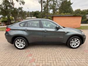 Green BMW X6 2009 in Valmiera, with an engine capacity of 3.00 L and mileage of 303 thousand km for 9990 €, photo 4 on AUTOMOTO.COM.LV