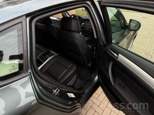 Green BMW X6 2009 in Valmiera, with an engine capacity of 3.00 L and mileage of 303 thousand km for 9990 €, photo 12 on AUTOMOTO.COM.LV