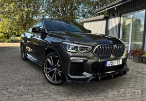 Green BMW X6 2019 in Riga, with an engine capacity of 3.00 L and mileage of 159 thousand km for 50400 €, photo 3 on AUTOMOTO.COM.LV