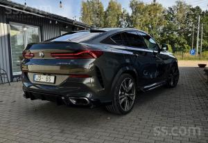 Green BMW X6 2019 in Riga, with an engine capacity of 3.00 L and mileage of 159 thousand km for 50400 €, photo 4 on AUTOMOTO.COM.LV