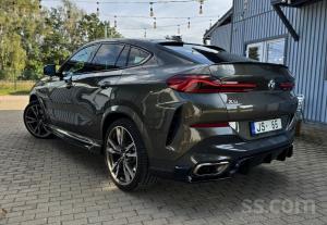 Green BMW X6 2019 in Riga, with an engine capacity of 3.00 L and mileage of 159 thousand km for 50400 €, photo 5 on AUTOMOTO.COM.LV