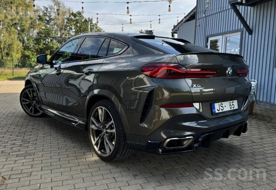 Green BMW X6 2019 in Riga, with an engine capacity of 3.00 L and mileage of 159 thousand km for 50400 €, photo 5 on AUTOMOTO.COM.LV