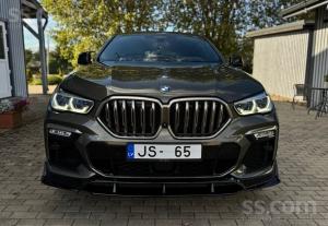Green BMW X6 2019 in Riga, with an engine capacity of 3.00 L and mileage of 159 thousand km for 50400 €, photo 6 on AUTOMOTO.COM.LV