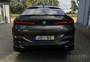 Green BMW X6 2019 in Riga, with an engine capacity of 3.00 L and mileage of 159 thousand km for 50400 €, photo 7 on AUTOMOTO.COM.LV