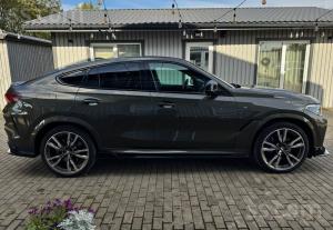 Green BMW X6 2019 in Riga, with an engine capacity of 3.00 L and mileage of 159 thousand km for 50400 €, photo 8 on AUTOMOTO.COM.LV