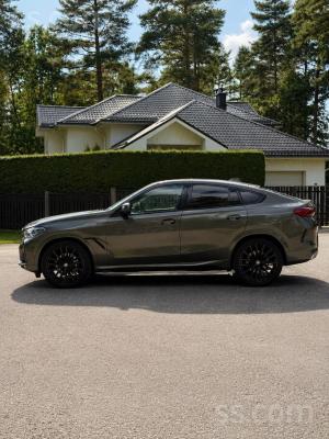 Green BMW X6 2020 in Riga, with an engine capacity of 3.00 L and mileage of 211 thousand km for 46500 €, photo 4 on AUTOMOTO.COM.LV