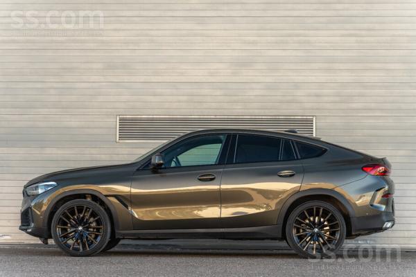 Green BMW X6 2021 in Riga, with an engine capacity of 3.00 L and mileage of 69 thousand km for 51500 €, photo 6 on AUTOMOTO.COM.LV