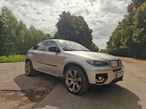 Grey BMW X6 2010 in Taurage, with an engine capacity of 2.99 L and mileage of 248 thousand km for 11200 €, photo  on AUTOMOTO.COM.LV