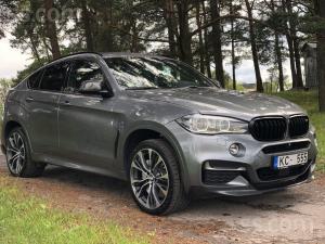 Grey BMW X6 2014 in Riga, with an engine capacity of 3.00 L and mileage of 0 thousand km for 26800 €, photo 4 on AUTOMOTO.COM.LV