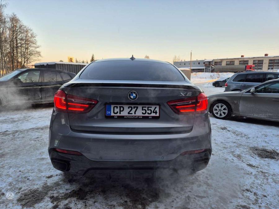 Grey BMW X6 2015 in Utena, with an engine capacity of 2.99 L and mileage of 334 thousand km for 22990 €, photo 6 on AUTOMOTO.COM.LV