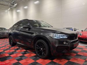 Grey BMW X6 2015 in Vilnius, with an engine capacity of 2.99 L and mileage of 194 thousand km for 24490 €, photo 3 on AUTOMOTO.COM.LV