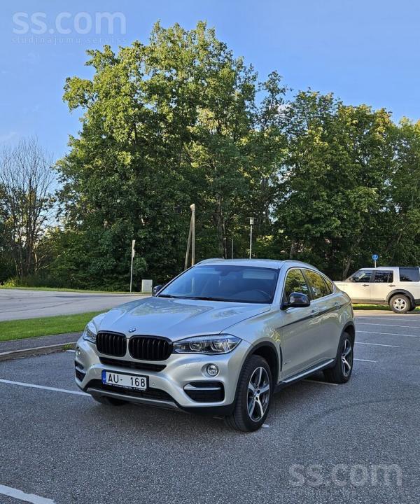 Grey BMW X6 2015 in Riga, with an engine capacity of 3.00 L and mileage of 133 thousand km for 23900 €, photo 10 on AUTOMOTO.COM.LV