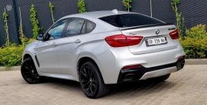 Grey BMW X6 2015 in Vilnius, with an engine capacity of 2.99 L and mileage of 229 thousand km for 19950 €, photo 5 on AUTOMOTO.COM.LV