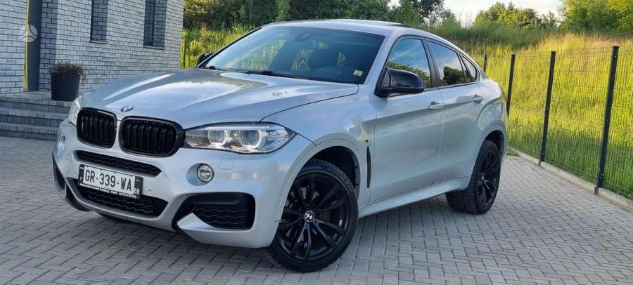 Grey BMW X6 2015 in Vilnius, with an engine capacity of 2.99 L and mileage of 230 thousand km for 19950 €, photo 6 on AUTOMOTO.COM.LV