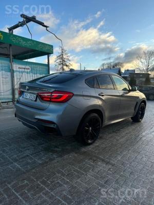 Grey BMW X6 2016 in Riga, with an engine capacity of 3.00 L and mileage of 302 thousand km for 20000 €, photo 7 on AUTOMOTO.COM.LV